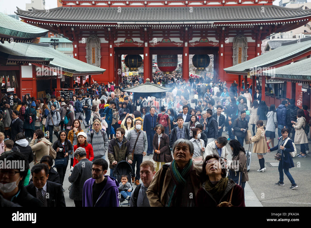 A crowd gathers for a ceremony at Asakusa Temple in Tokyo Japan Stock ...