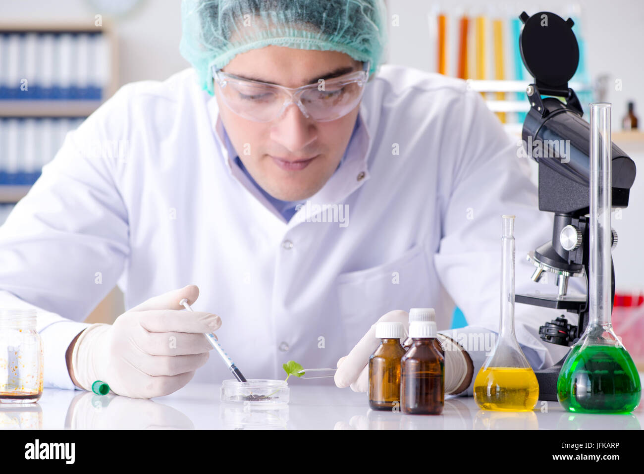 Pharmaceutical industry concept with scientist in the lab Stock Photo ...