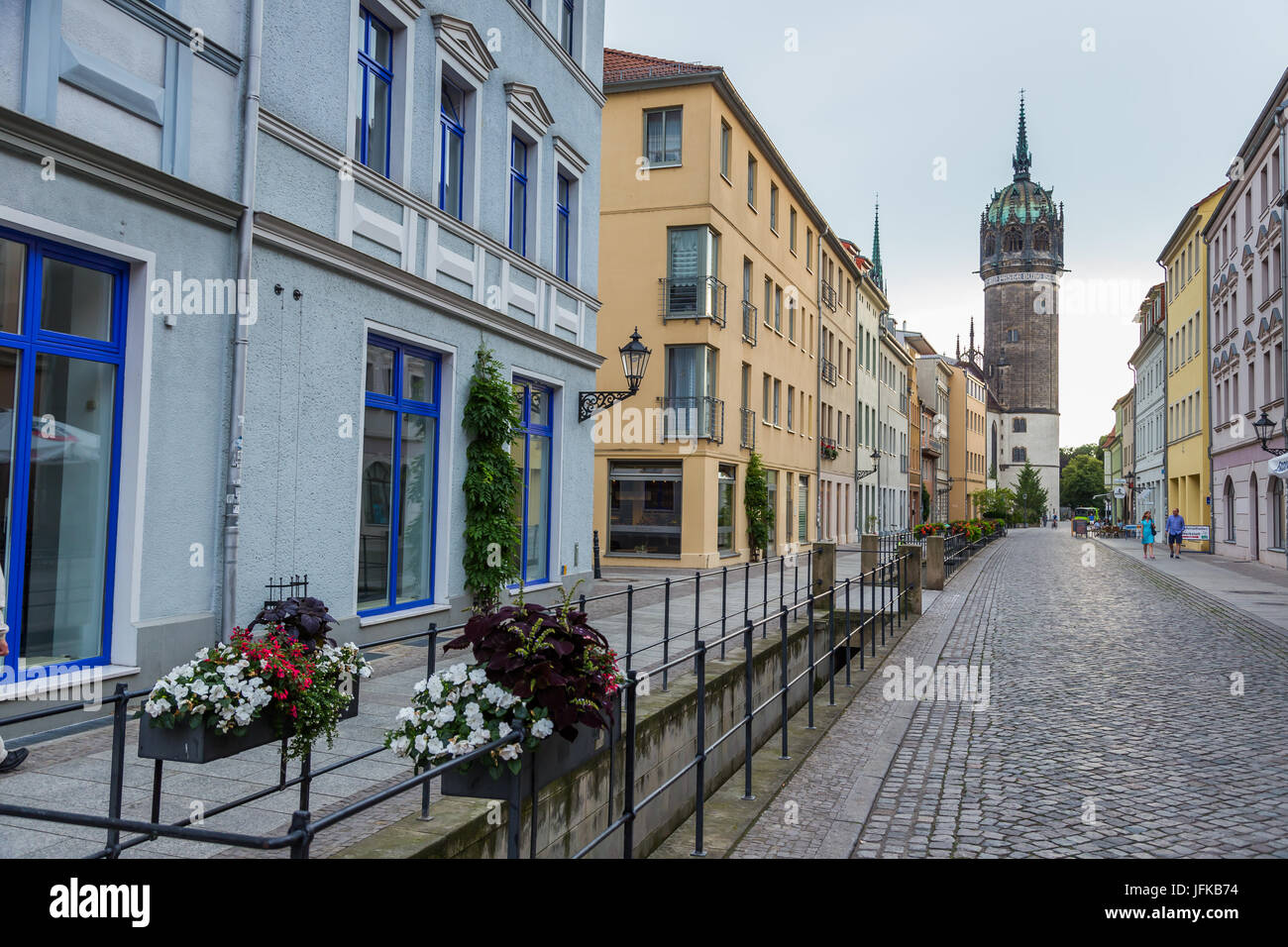 Street with canal Stock Photo - Alamy