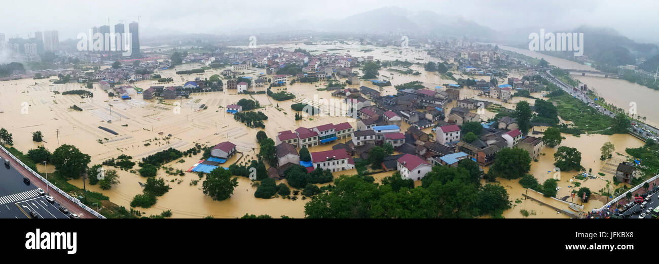Changsha. 1st July, 2017. A residential area is seen submerged in water ...