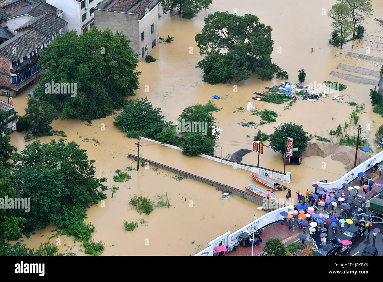 Changsha. 1st July, 2017. A residential area is seen submerged in water ...