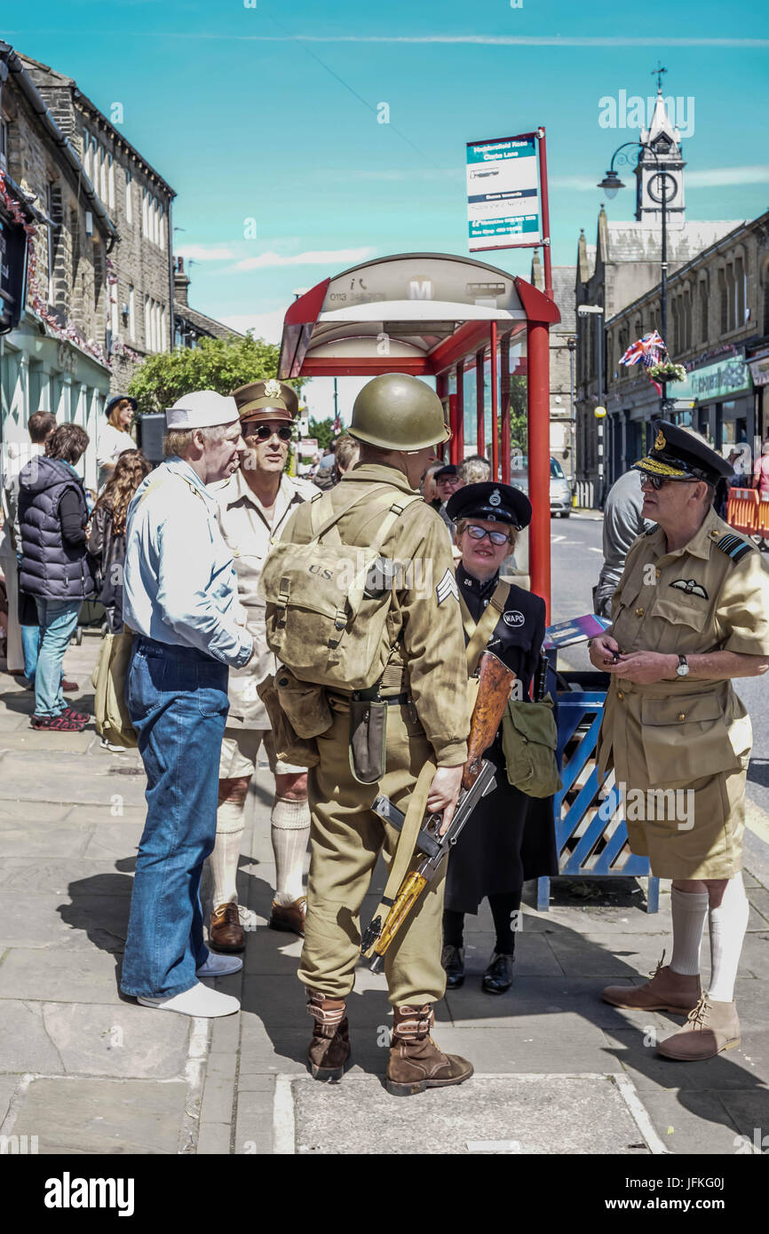 Meltham, Huddersfield, England. 1st July. Locals dressed as military at ...