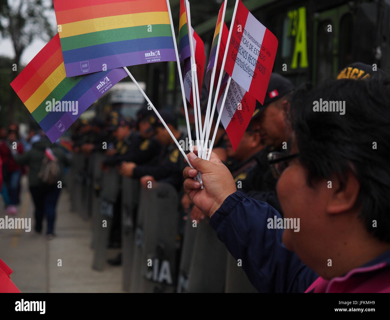 Lima, Peru. 01st July, 2017. Peruvian and gay flags offered in the ...