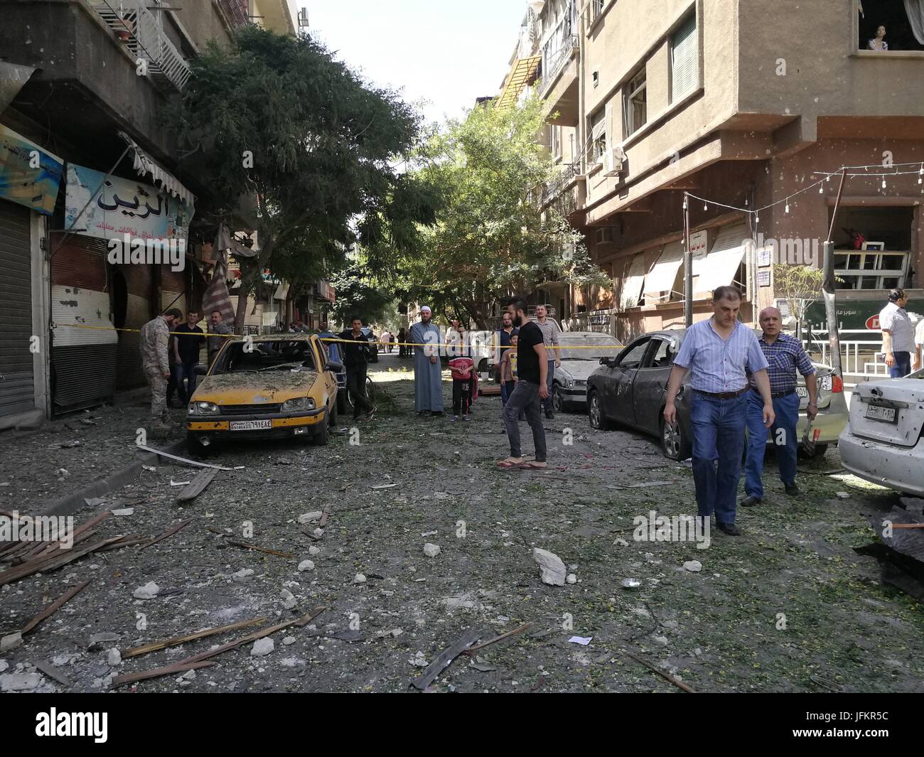 Damascus, Syria. 2nd July, 2017. Civilians check the damage of their ...