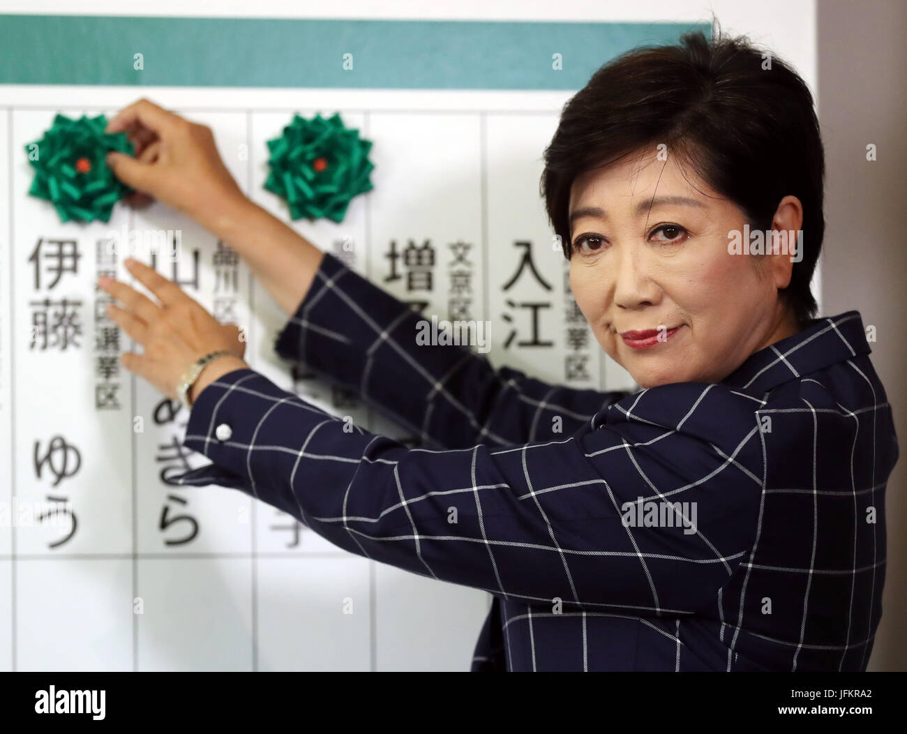 Tokyo, Japan. 2nd July, 2017. Tokyo Governor Yuriko Koike puts a ...