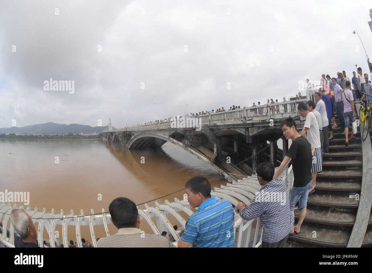 Changsha, China's Hunan Province, China. 2nd July, 2017. Citizens watch ...