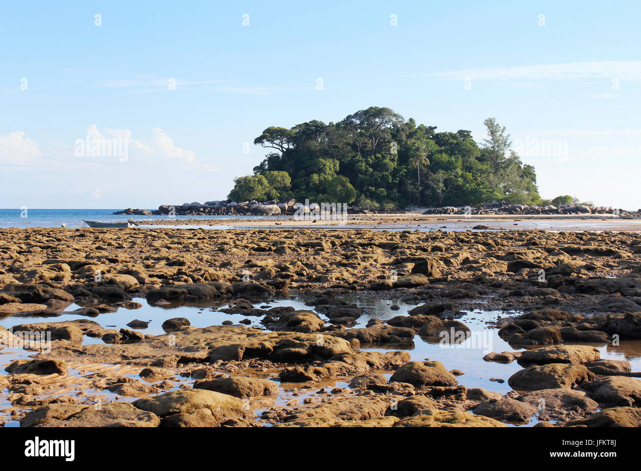 Seaside view of low tide with the mountain at Tioman Island Stock Photo ...