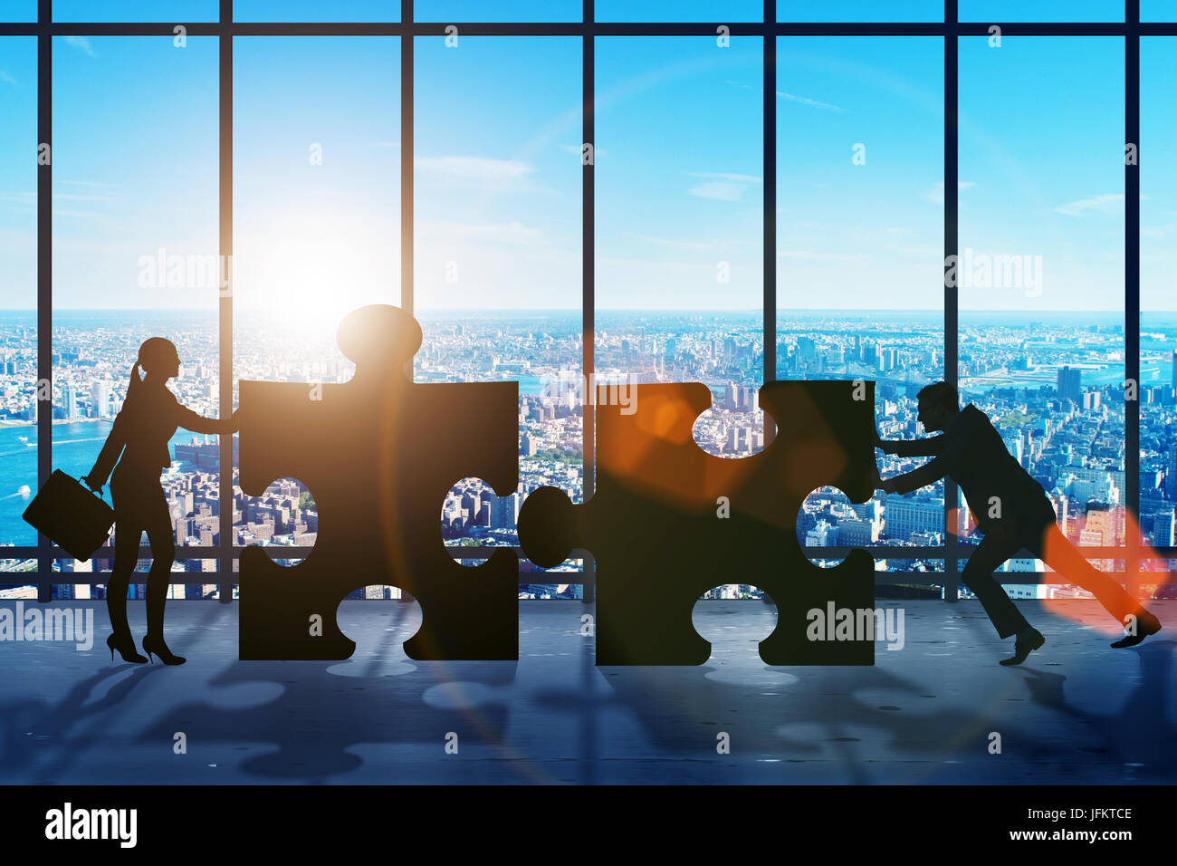 Business concept of teamwork with jigsaw puzzle Stock Photo - Alamy
