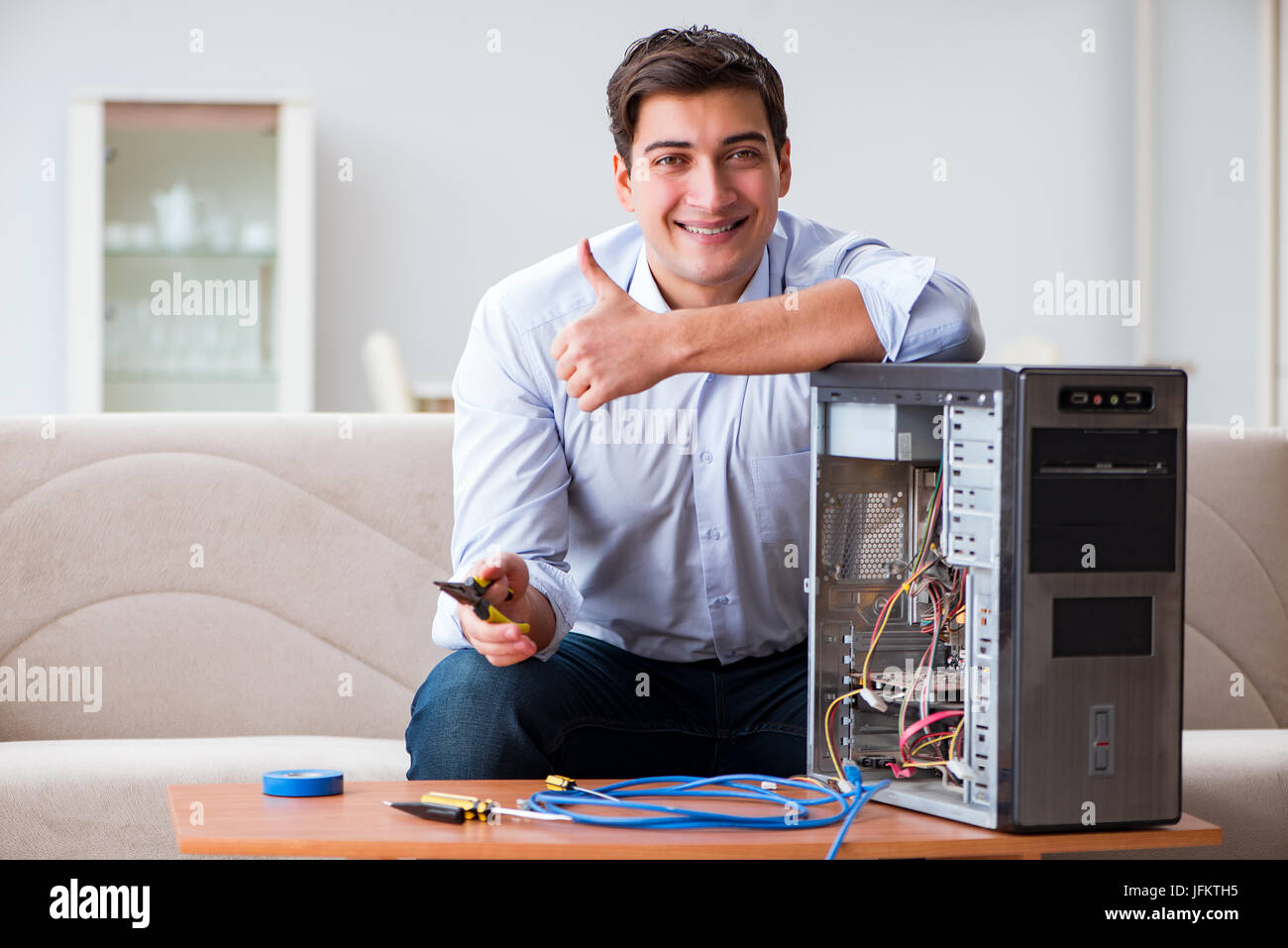 IT technician repairing broken pc desktop computer Stock Photo - Alamy