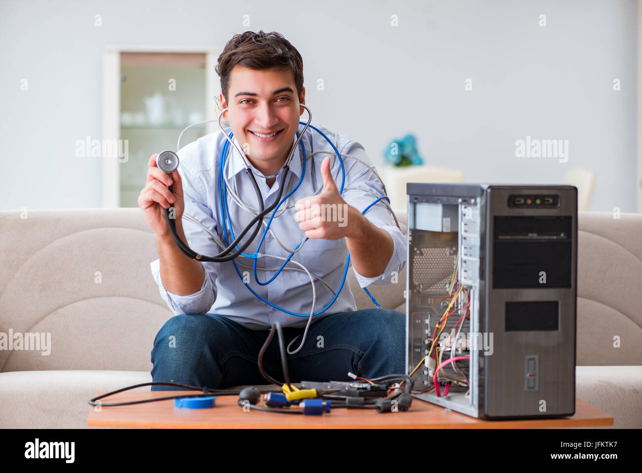 Happy computer engineer thumb up hi-res stock photography and images ...
