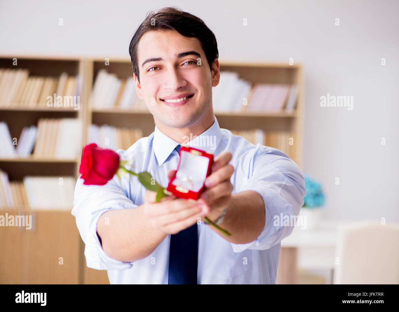 Romantic concept with man making marriage proposal Stock Photo - Alamy