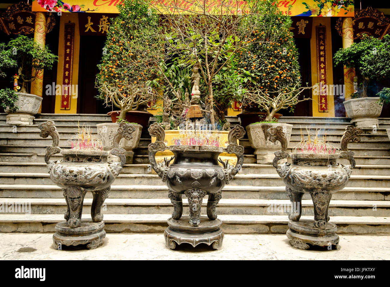 Three Urns at a Hanoi Pagoda Stock Photo - Alamy