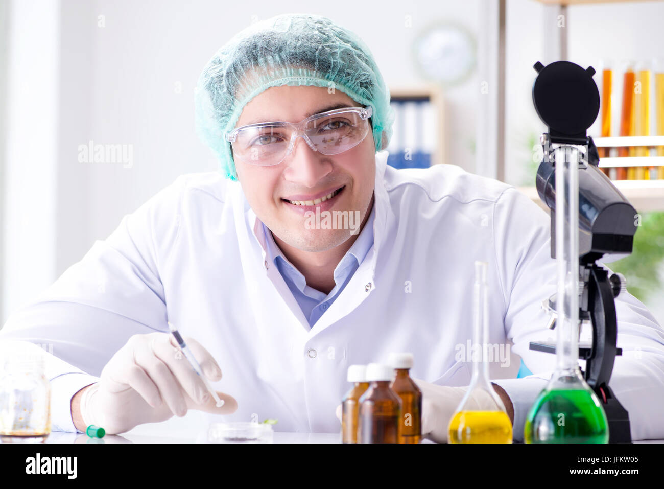 Pharmaceutical industry concept with scientist in the lab Stock Photo ...