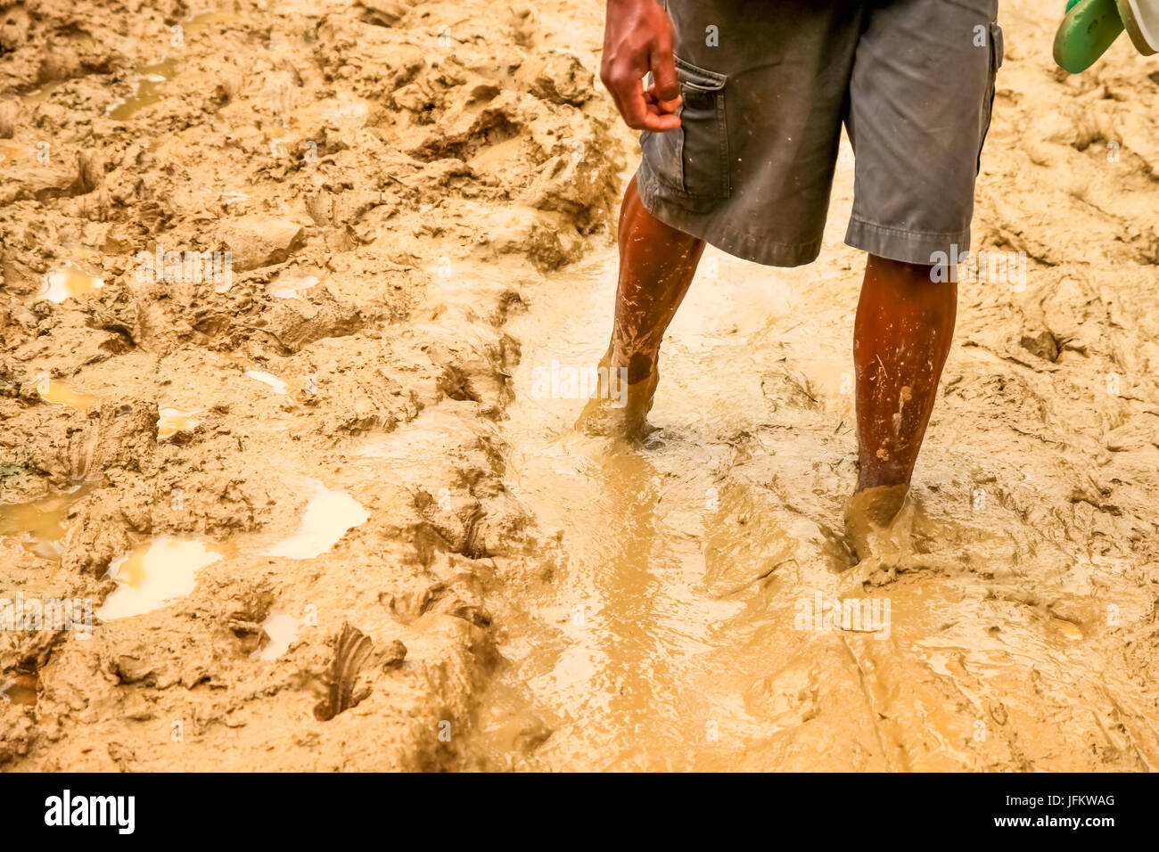 Walking in mud Stock Photo - Alamy