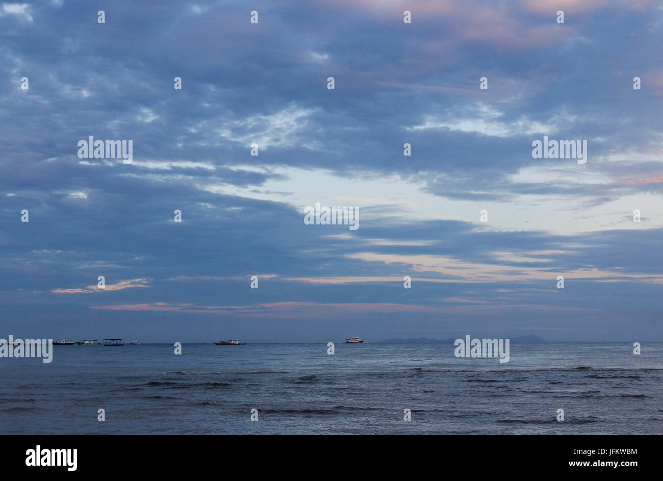 View of dawn at the seaside with the dramatic cloudscape, Tioman Island ...