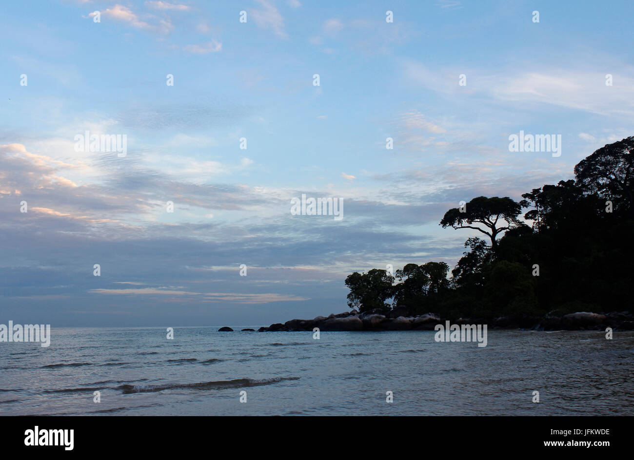 View of dawn at the seaside with the dramatic sky and mountain, Tioman ...
