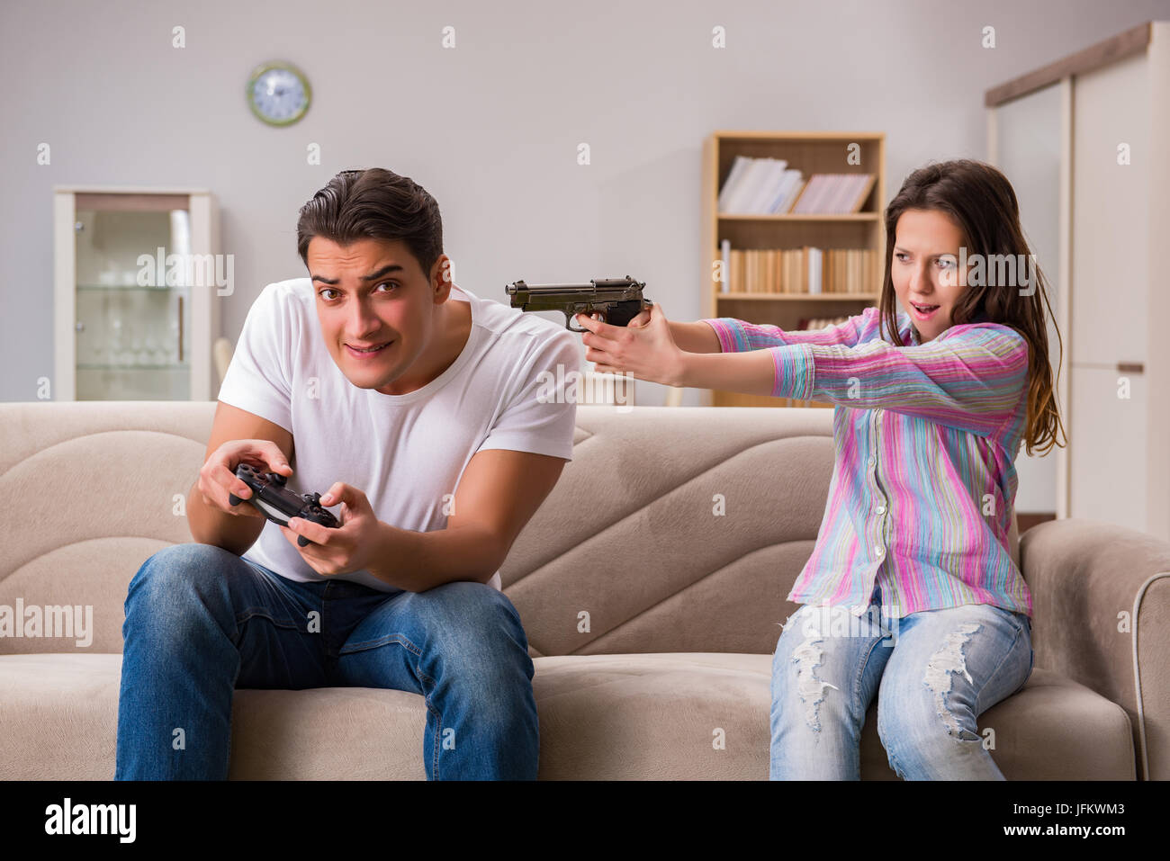 Young family suffering from computer games addiction Stock Photo - Alamy