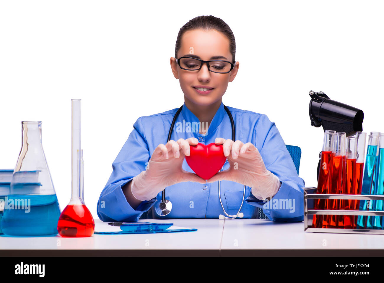 Young female doctor in lab isolated on white Stock Photo - Alamy