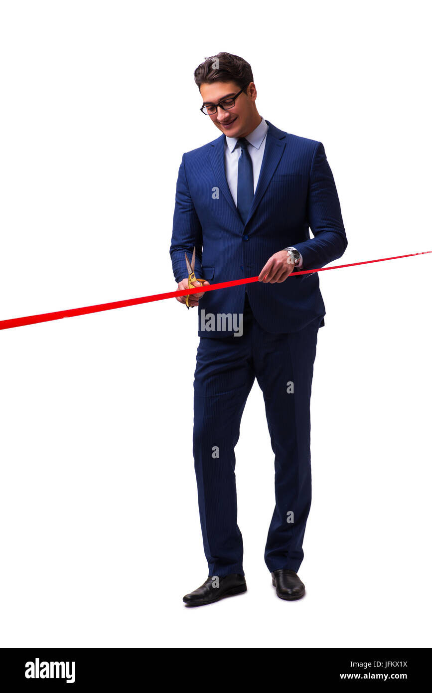Businessman cutting red ribbon isolated on white Stock Photo - Alamy