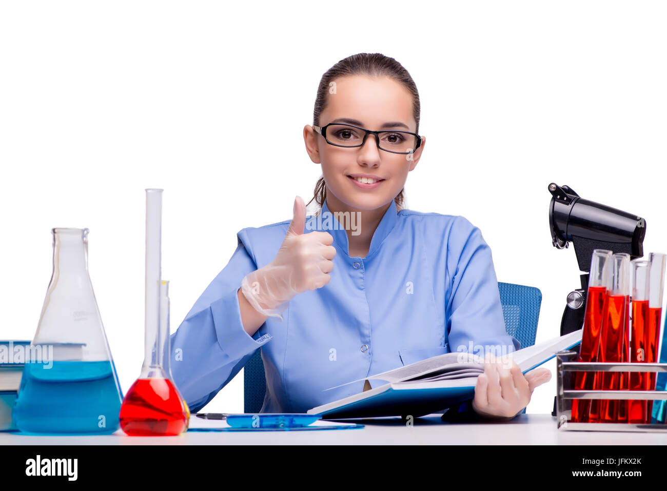 Lab chemist working with microscope and tubes Stock Photo - Alamy