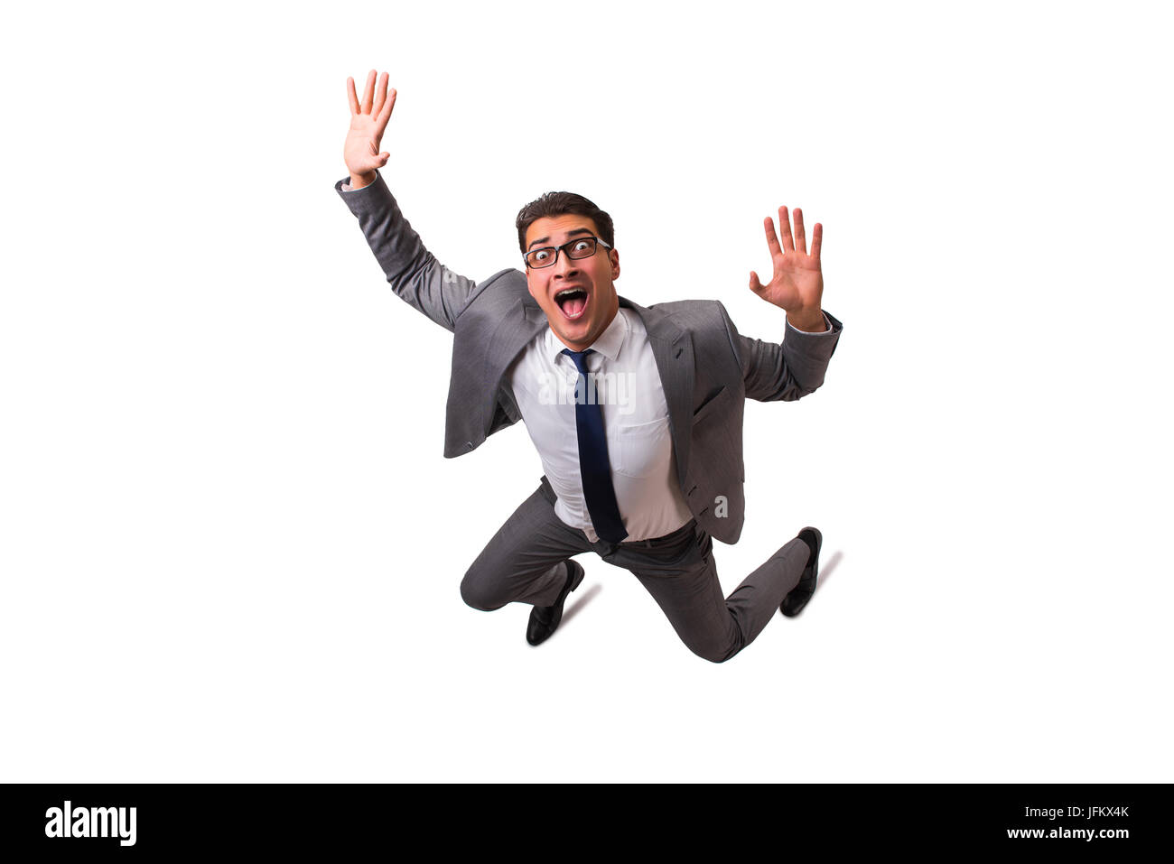 Falling businessman isolated on the white background Stock Photo - Alamy