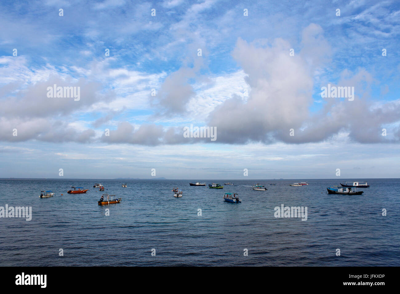Morning view of Tioman Island with the boats floating in the sea ...