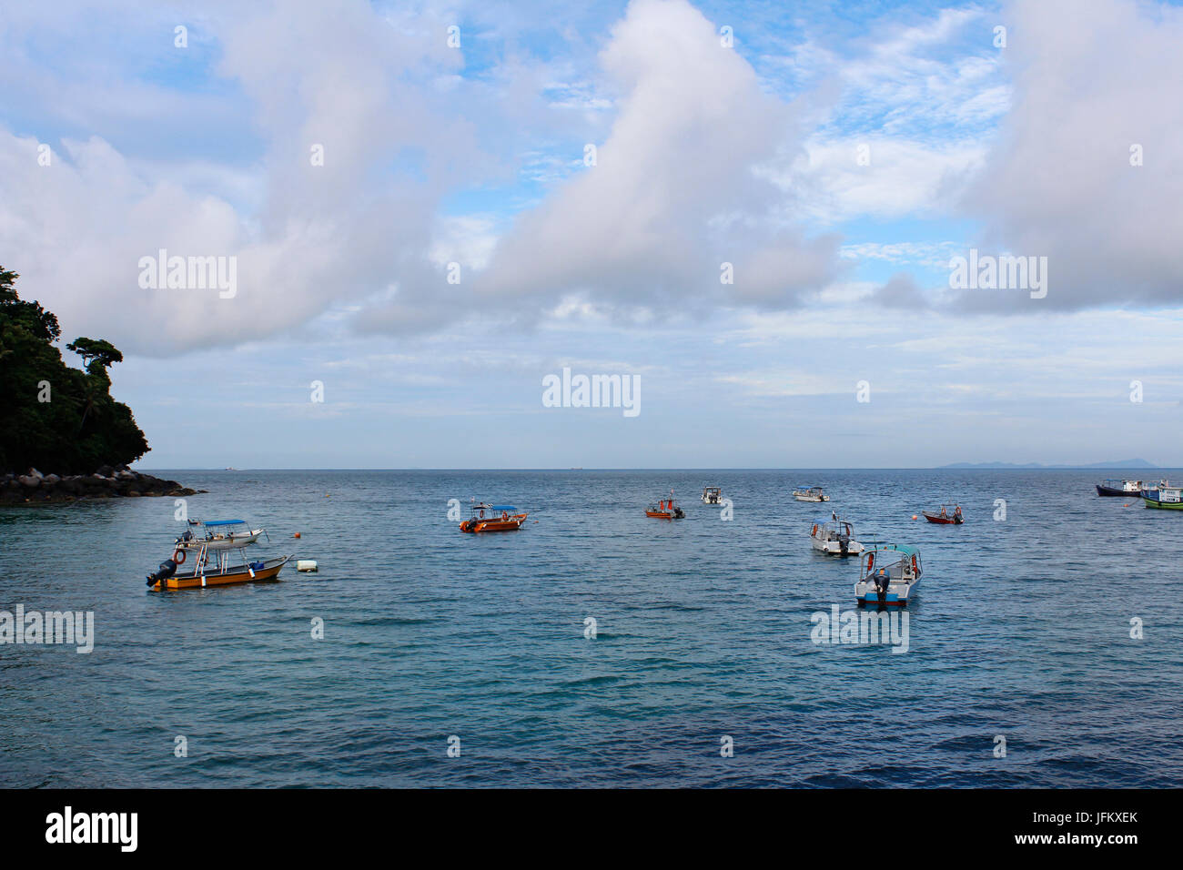 Morning view of Tioman Island with the boats floating in the sea ...