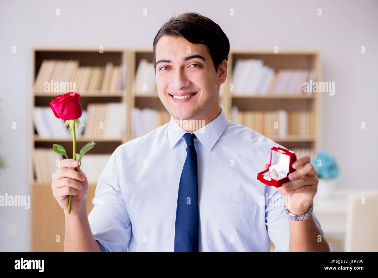 Romantic concept with man making marriage proposal Stock Photo - Alamy