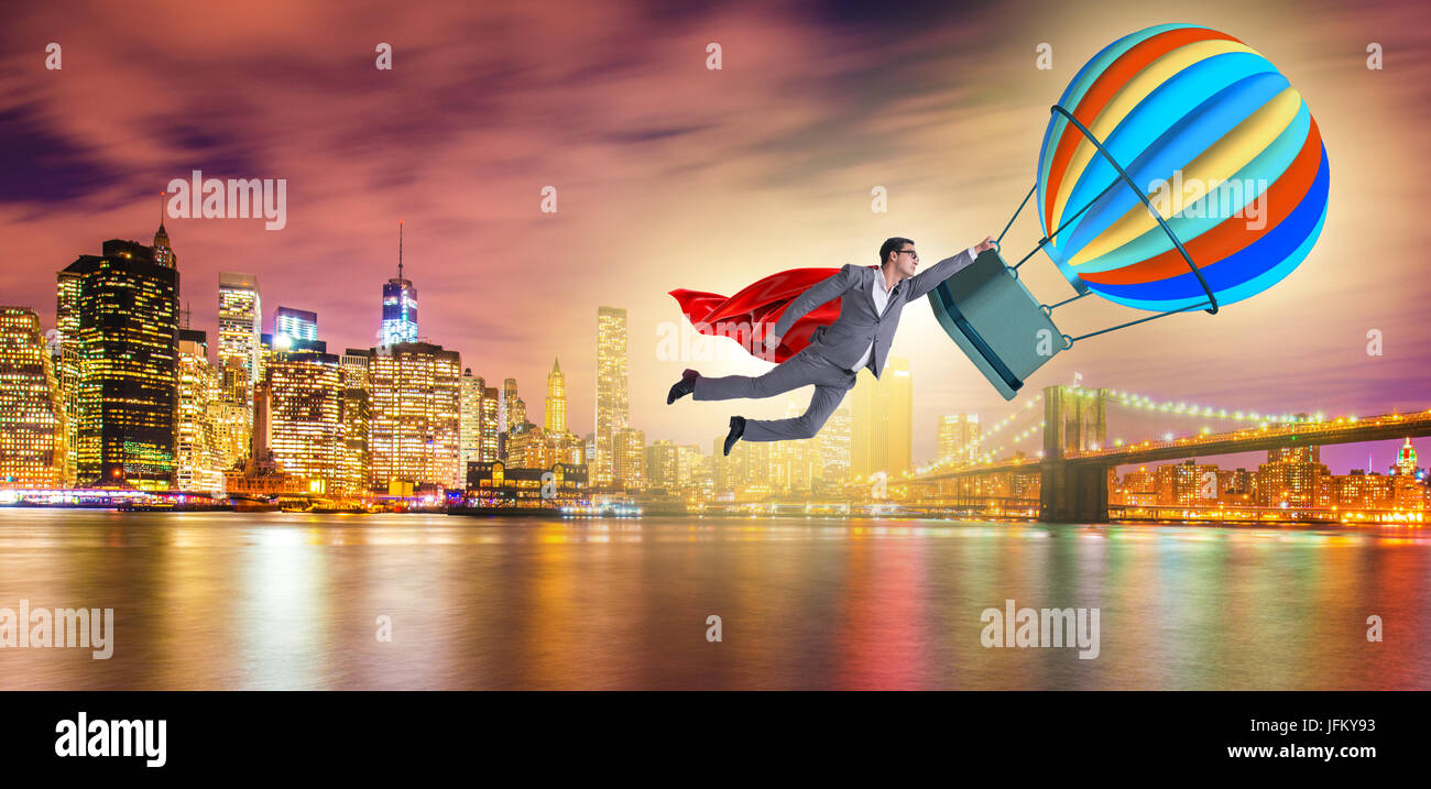 Businessman flying on balloon in challenge concept Stock Photo - Alamy