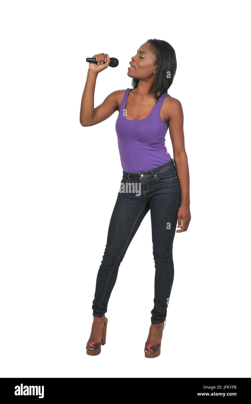 Beautiful woman singer performing at a concert Stock Photo - Alamy