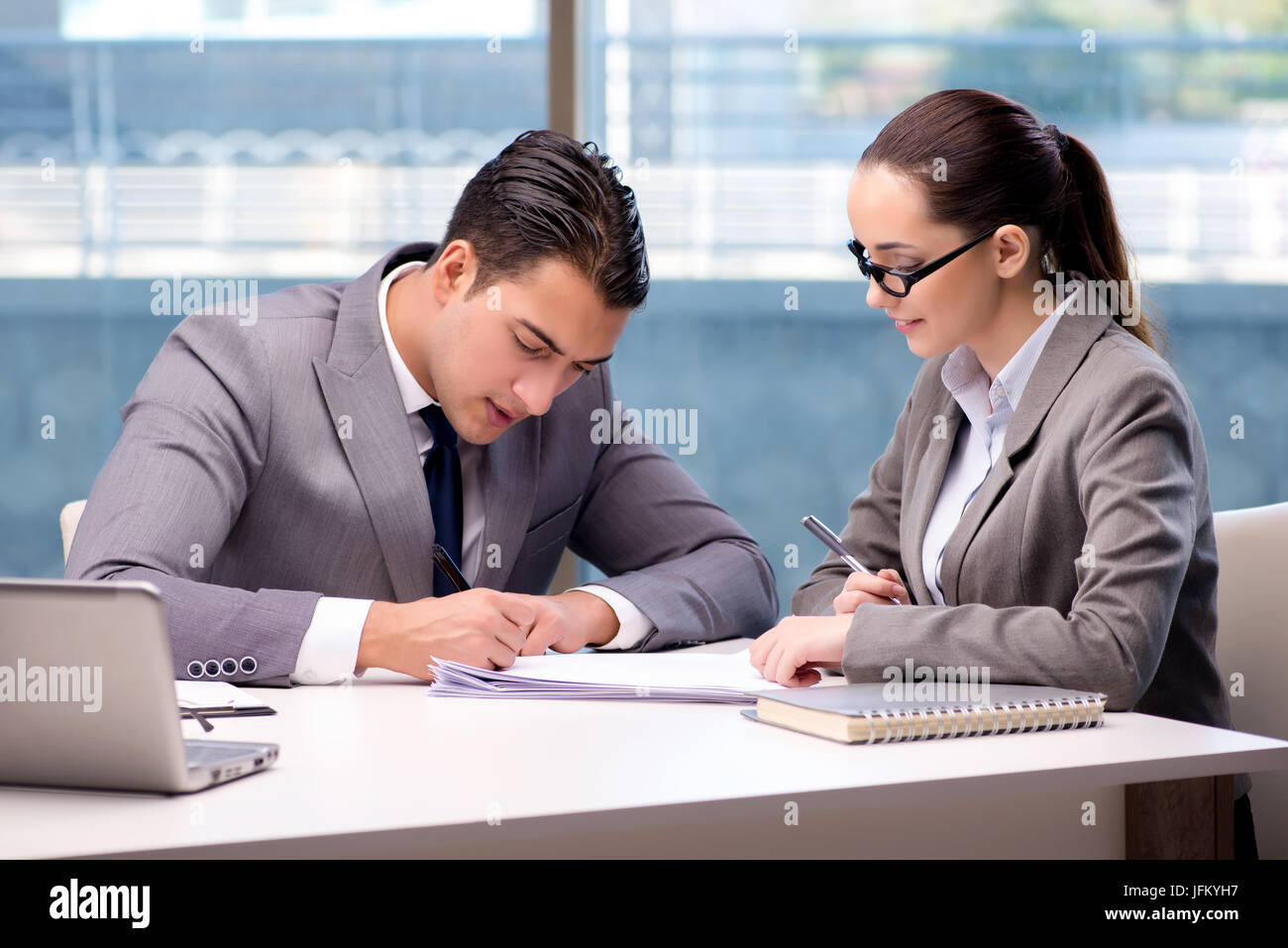 Businesspeople having discussion in the office Stock Photo - Alamy