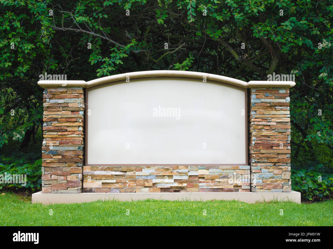 blank stone sign marker in garden Stock Photo - Alamy
