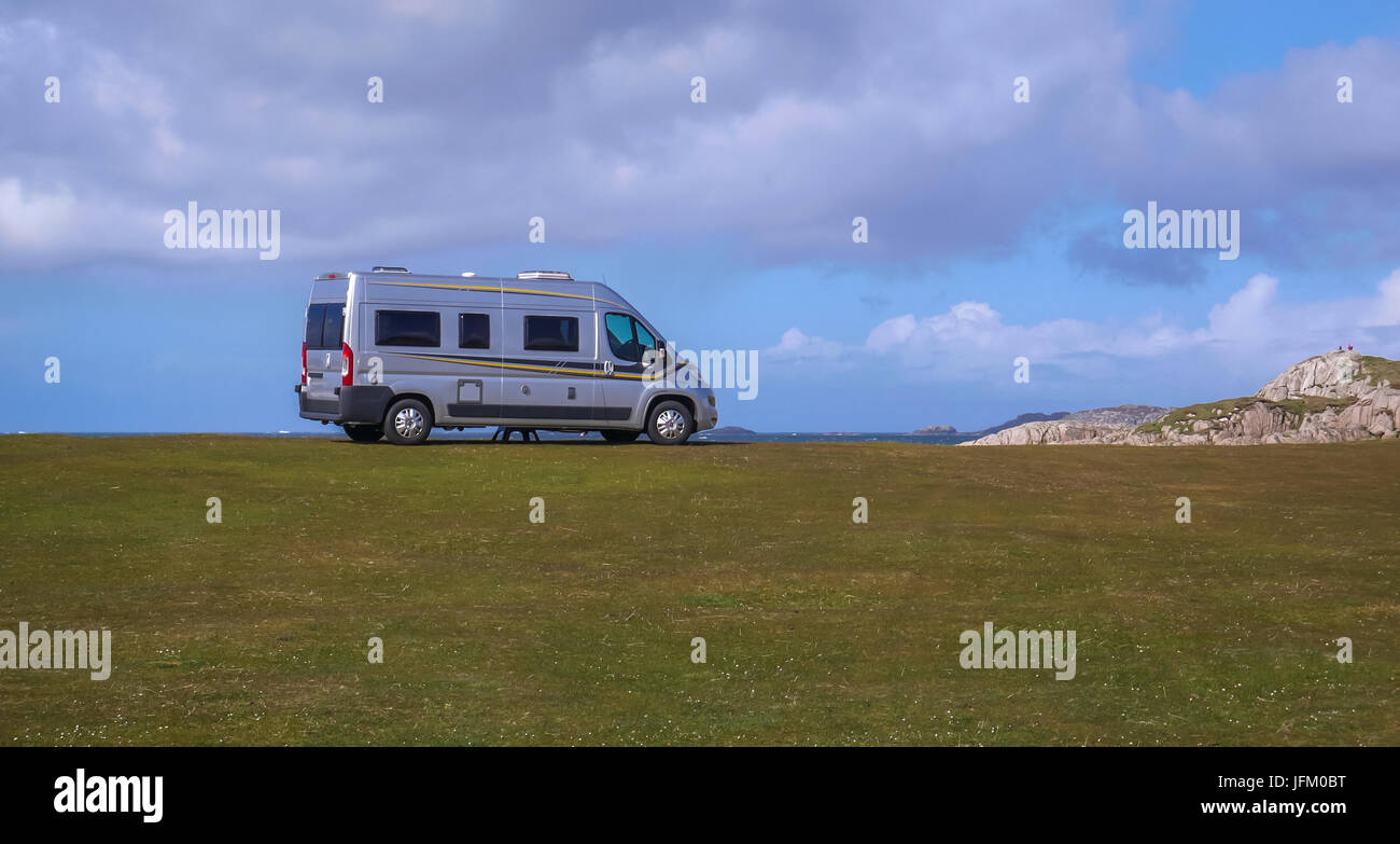 Fiat campervan parked on remote seaside location at Fidden Farm ...