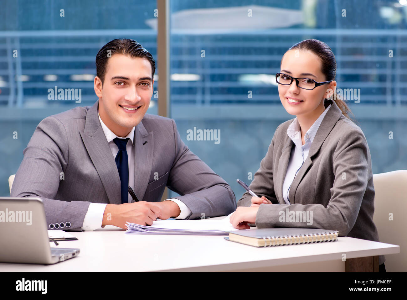 Businesspeople having discussion in the office Stock Photo - Alamy