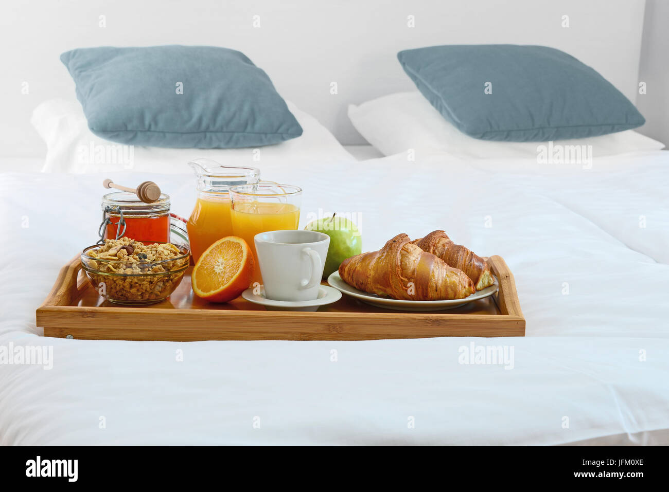 Breakfast in bed in hotel room. Accommodation Stock Photo - Alamy