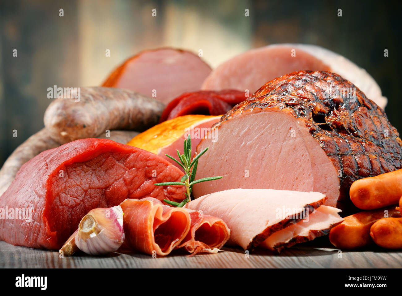 Assorted meat products including ham and sausages Stock Photo - Alamy