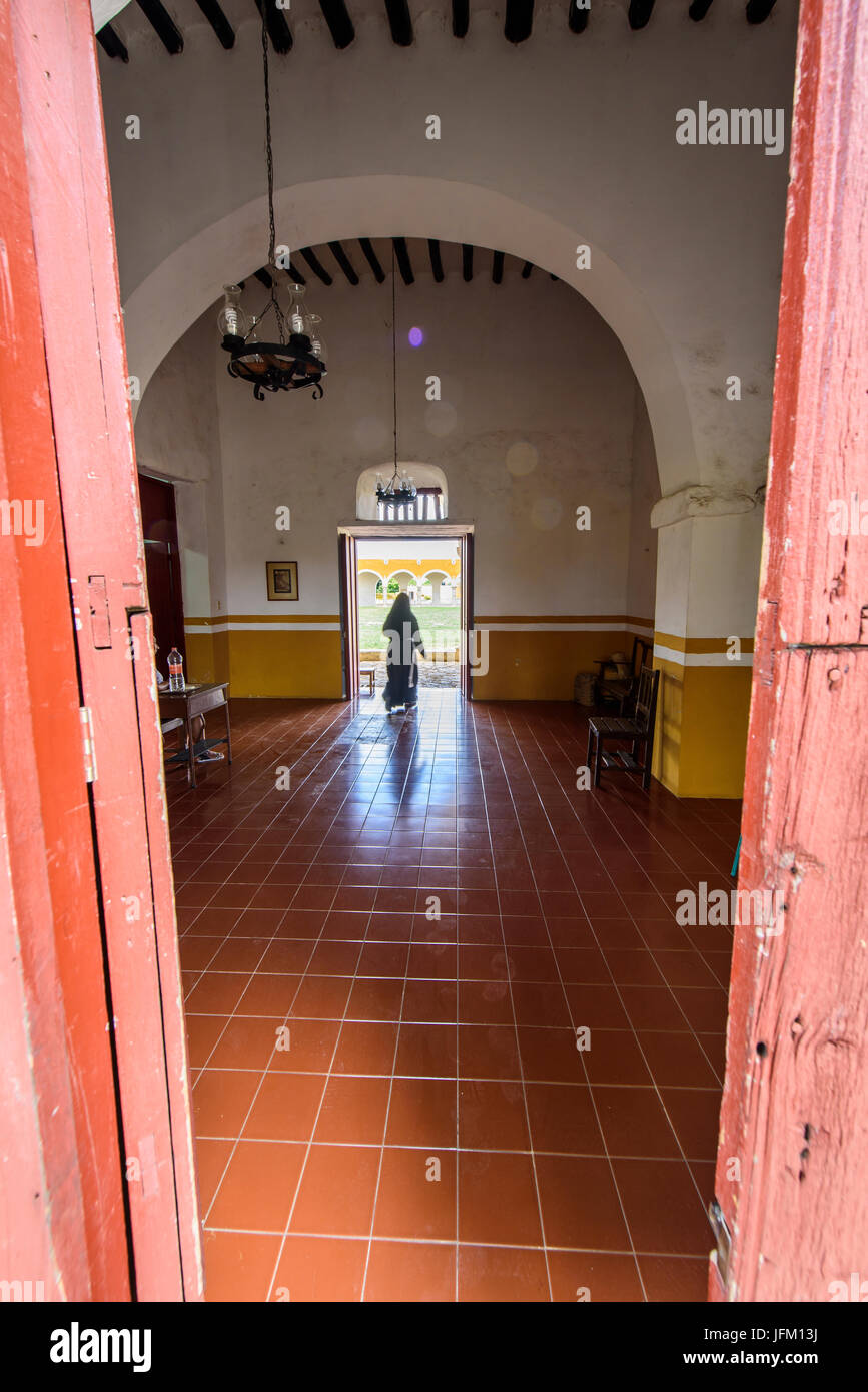Nun in the interior of the San Antonio de Padua convent in Izamal ...