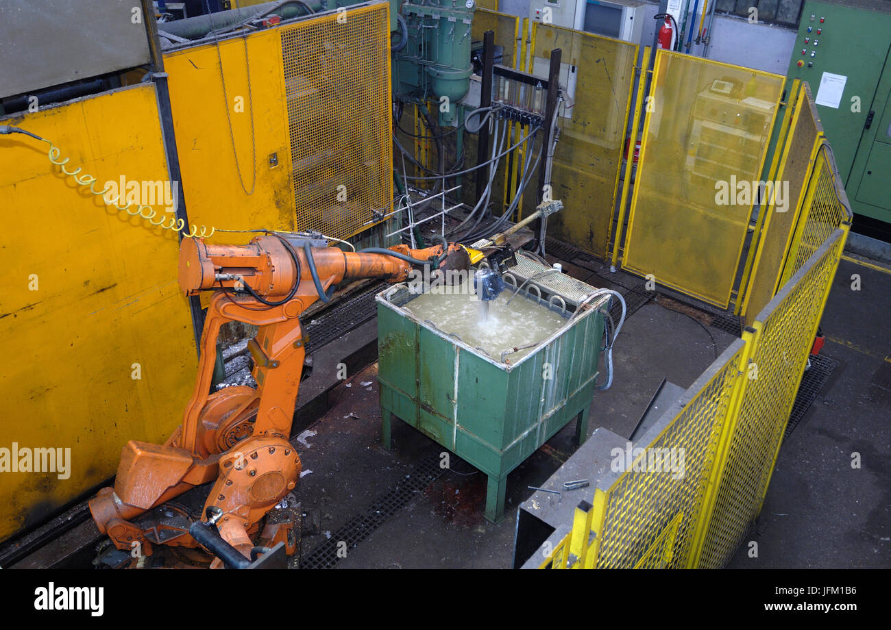 robot in an engine factory Stock Photo - Alamy
