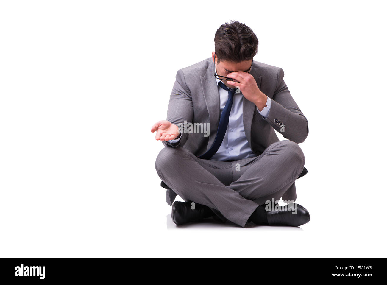 Bankrupt businessman isolated on white background Stock Photo - Alamy