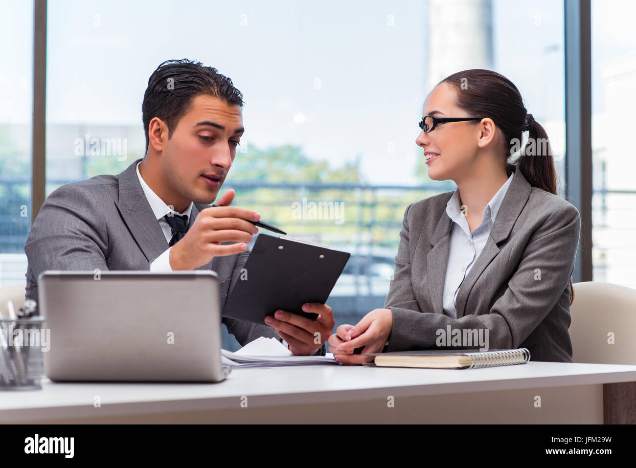 Businesspeople having discussion in the office Stock Photo - Alamy
