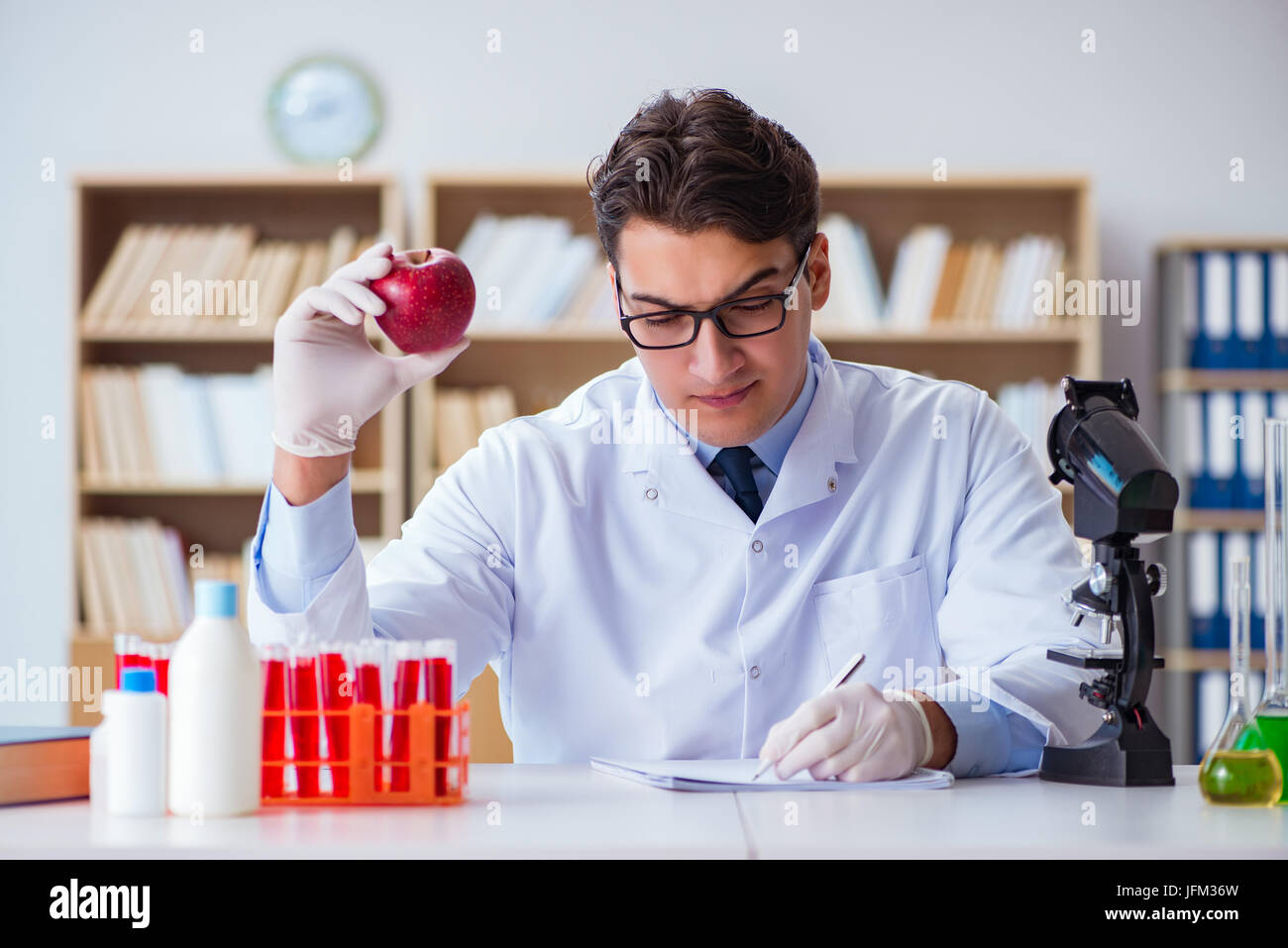 Scientist working on organic fruits and vegetables Stock Photo - Alamy