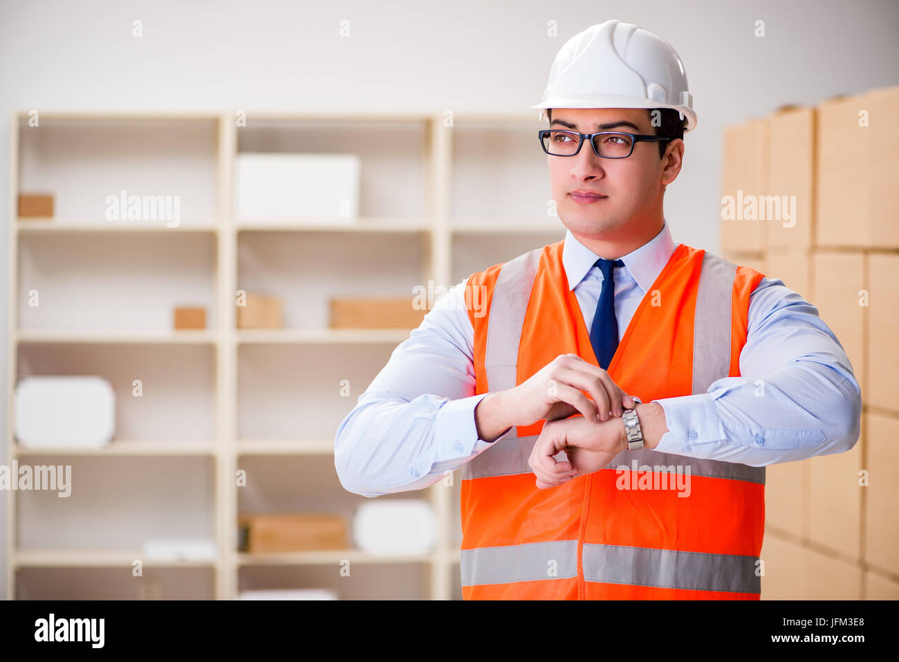 Man working in postal parcel delivery service office Stock Photo - Alamy