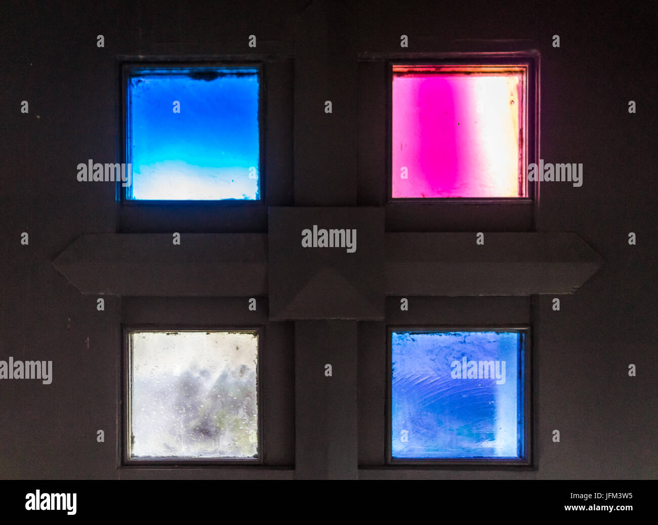 Four small colorful stained glass window squares closeup Stock Photo ...