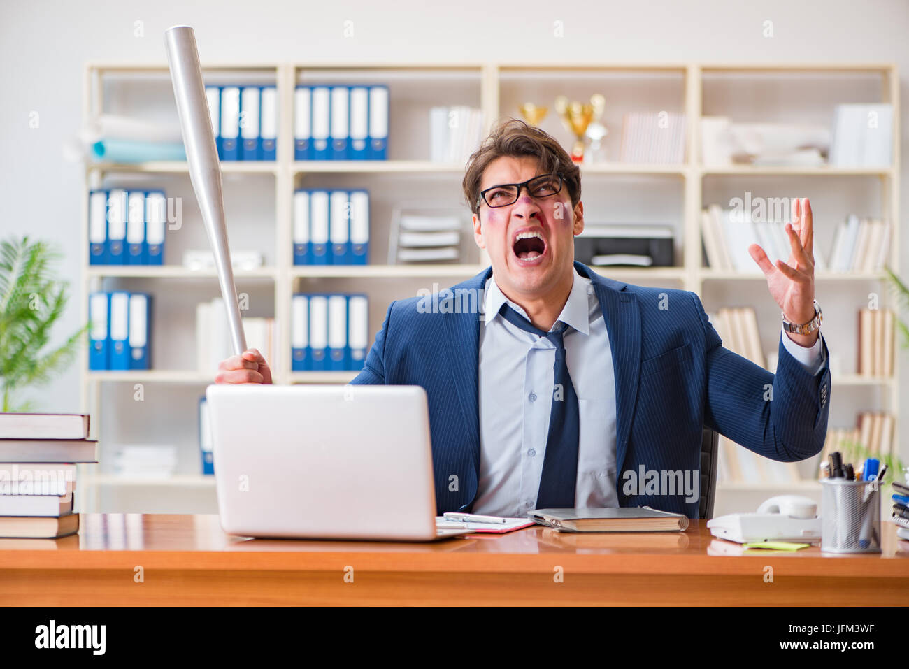 Angry aggressive businessman in the office Stock Photo - Alamy