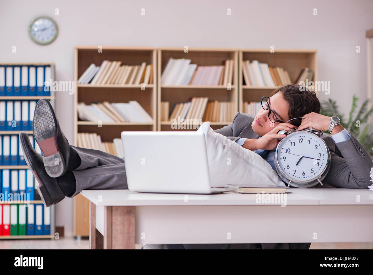 Tired man sleeping at home having too much work Stock Photo - Alamy