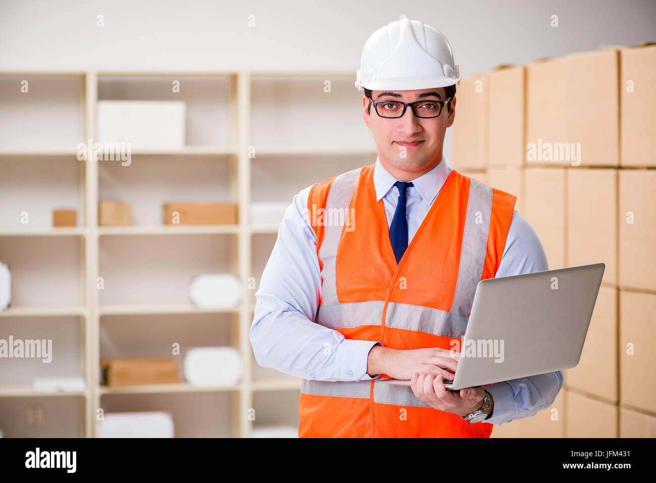 Man working in postal parcel delivery service office Stock Photo - Alamy