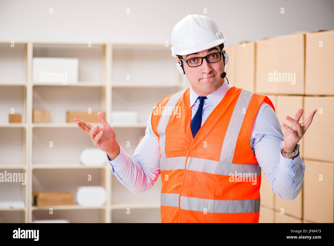 Man working in postal parcel delivery service office Stock Photo - Alamy