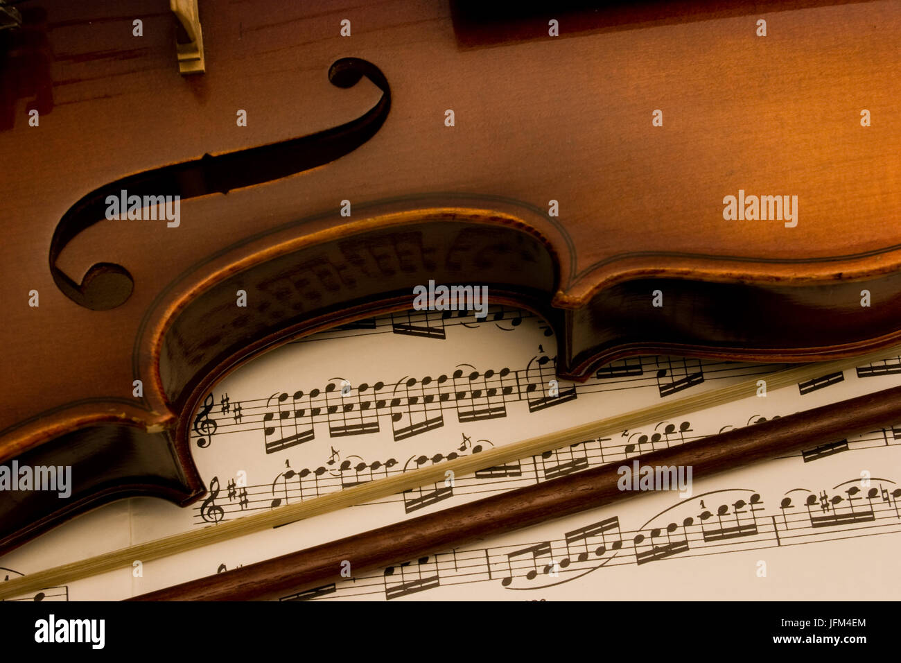 Violin on Music Stock Photo - Alamy