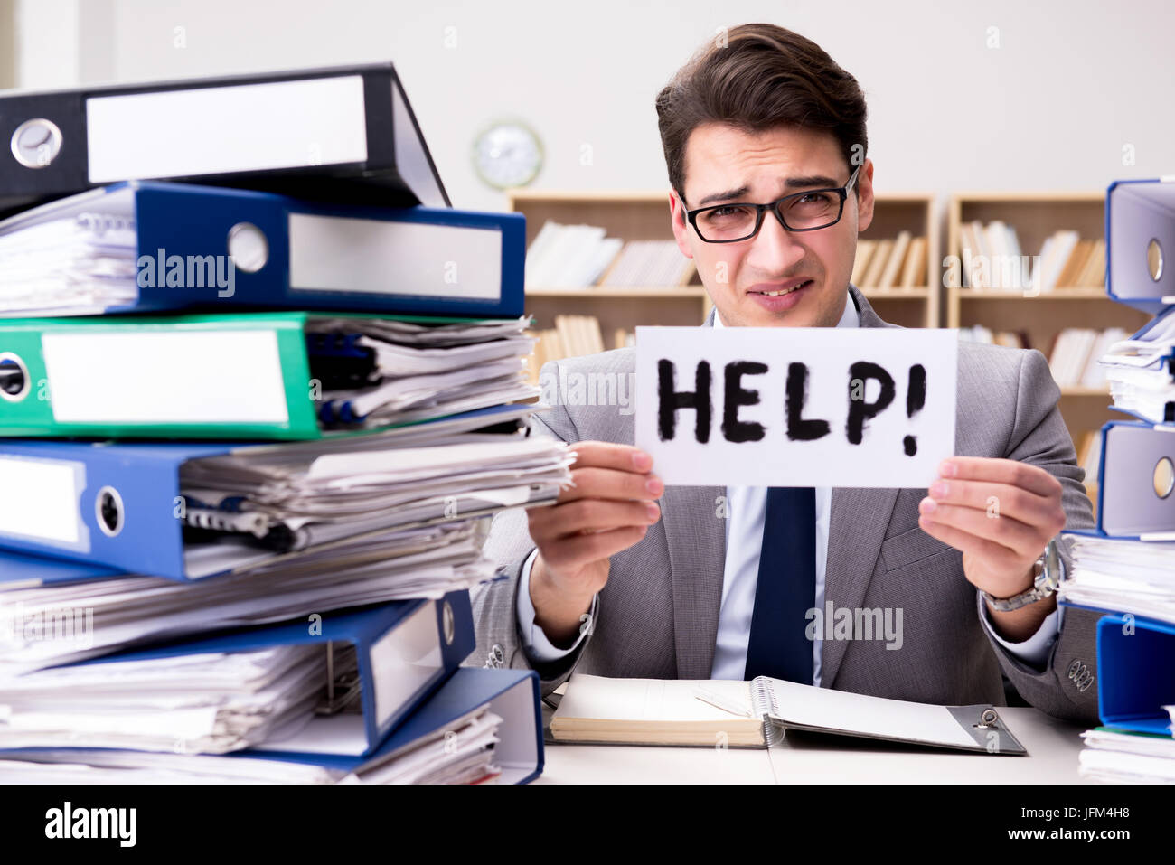 Busy businessman asking for help with work Stock Photo - Alamy