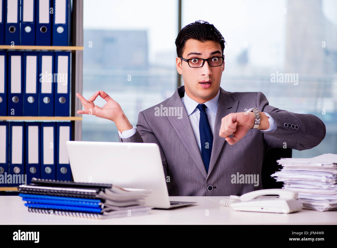 Man being late for his deadlines Stock Photo - Alamy